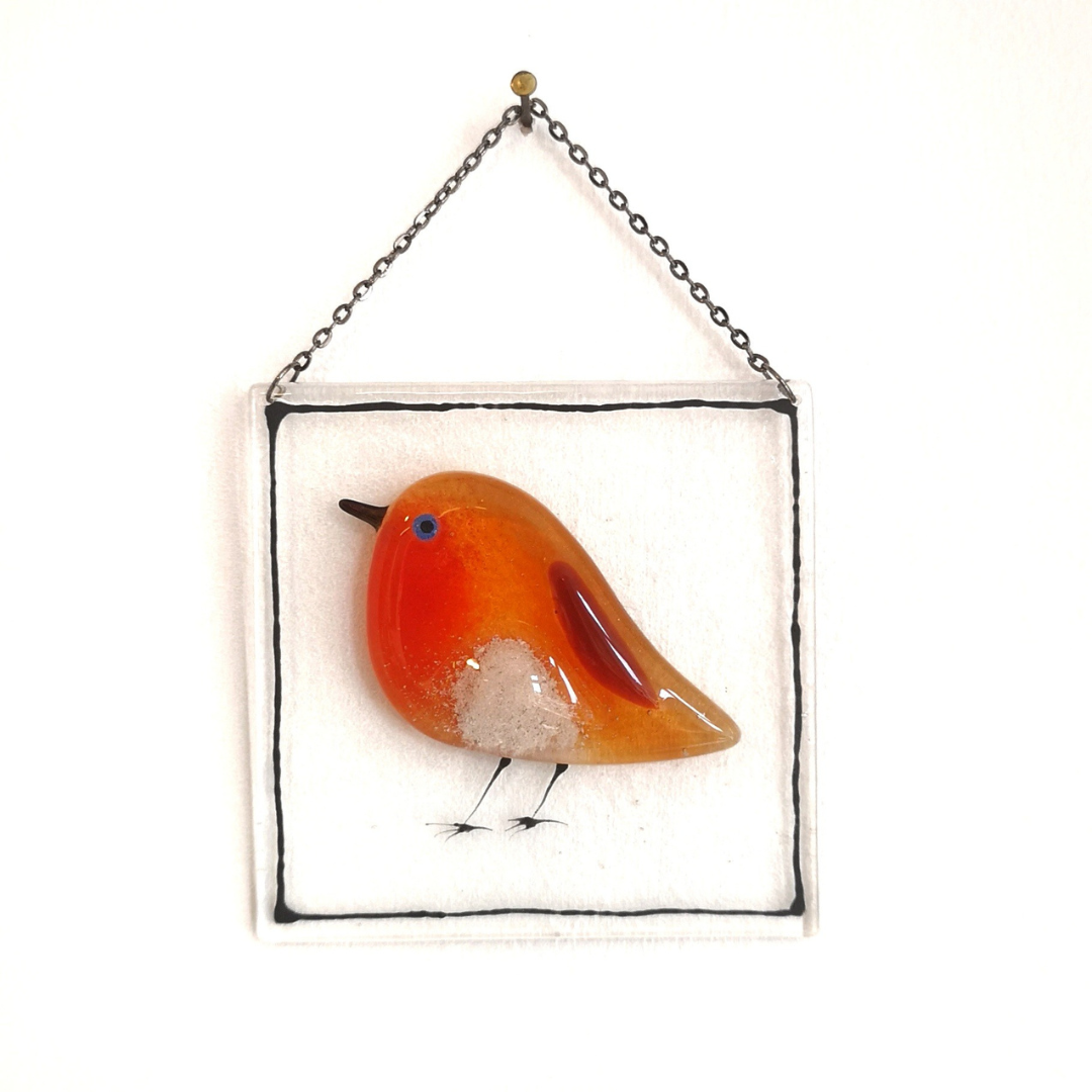 A fused glass robin memorial in the form of a glass picture to hang on ...