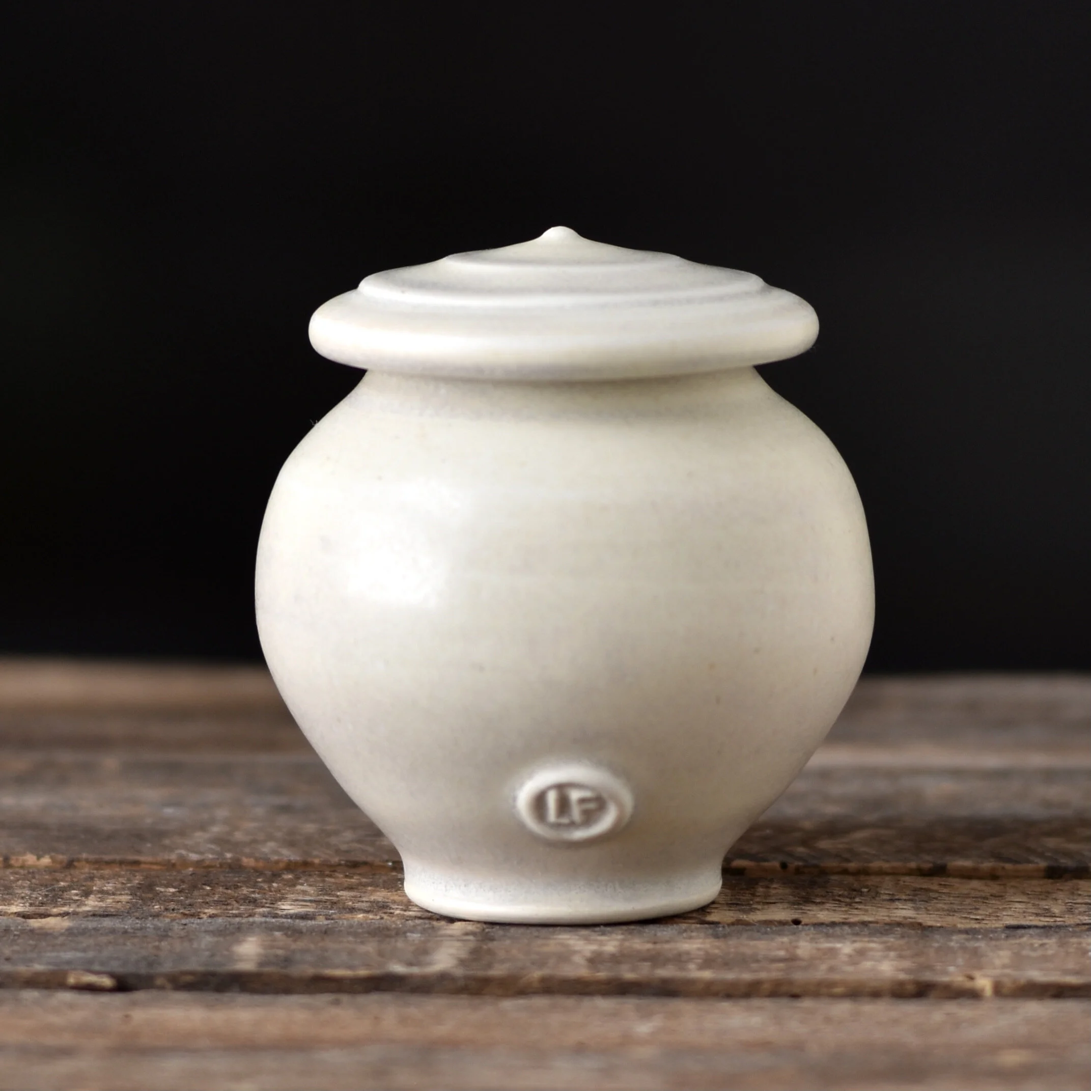 Shop online for handcrafted cremation urns — Lucia Urns