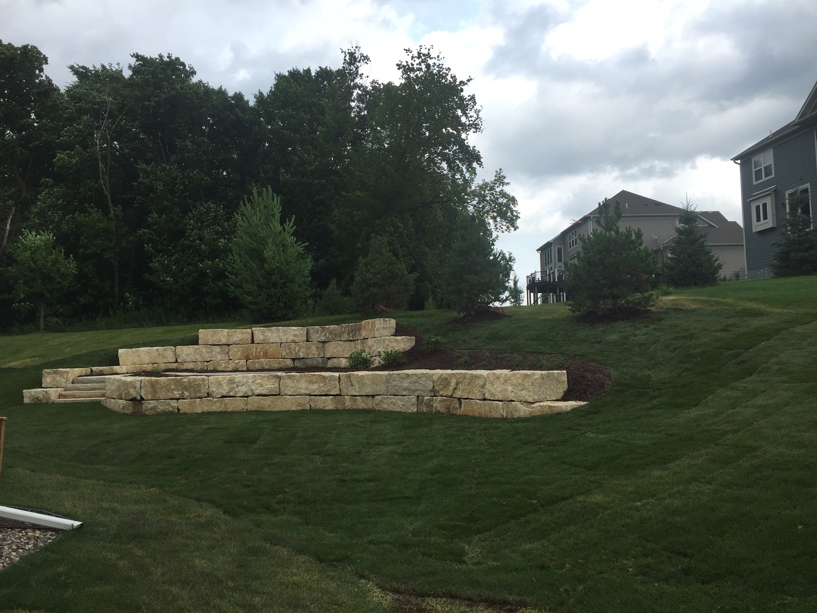 Limestone Boulder Retaining Walls | Twin Cities, MN — Stonewall Inc ...