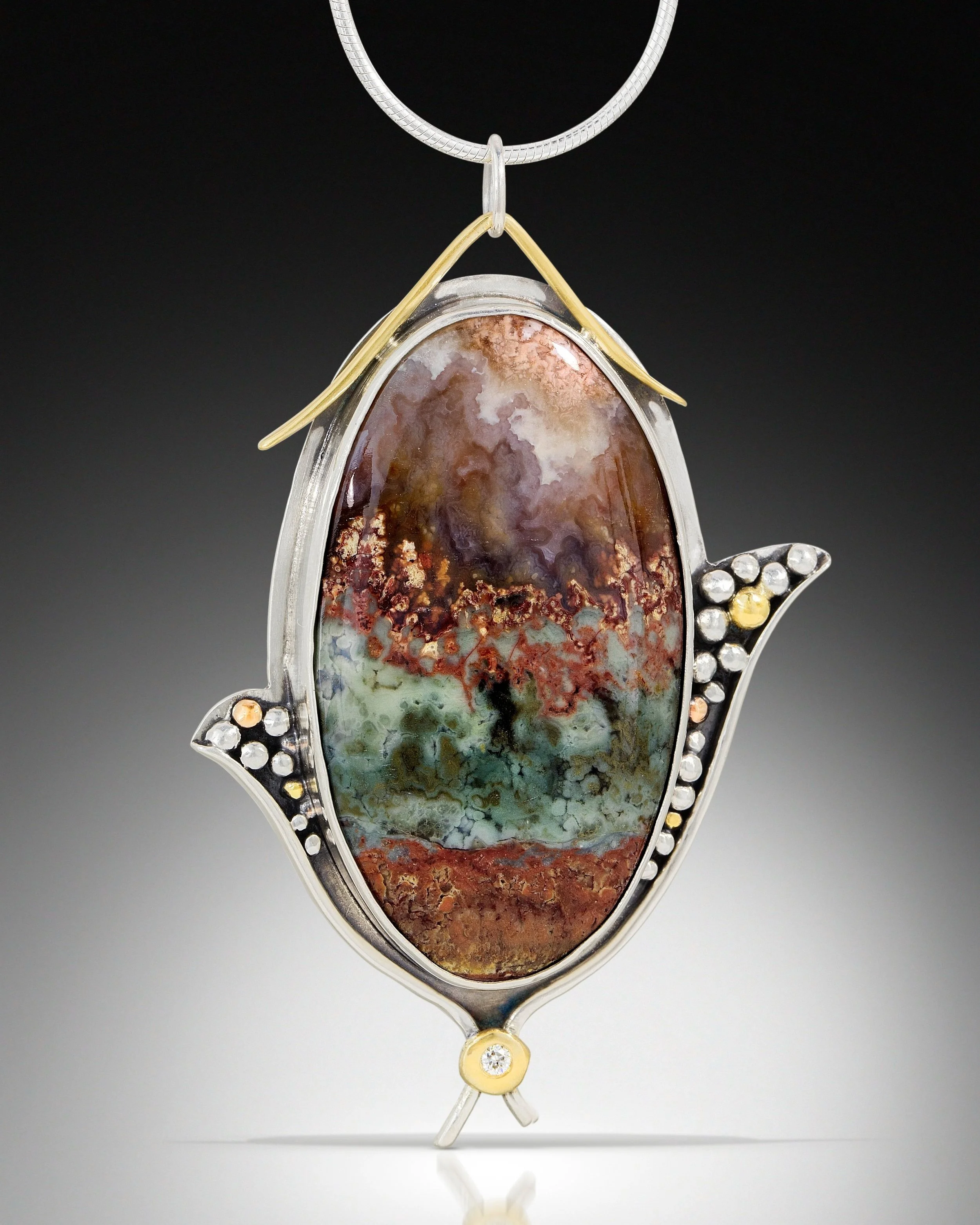 K. Likos Metal and Stone Jewelry