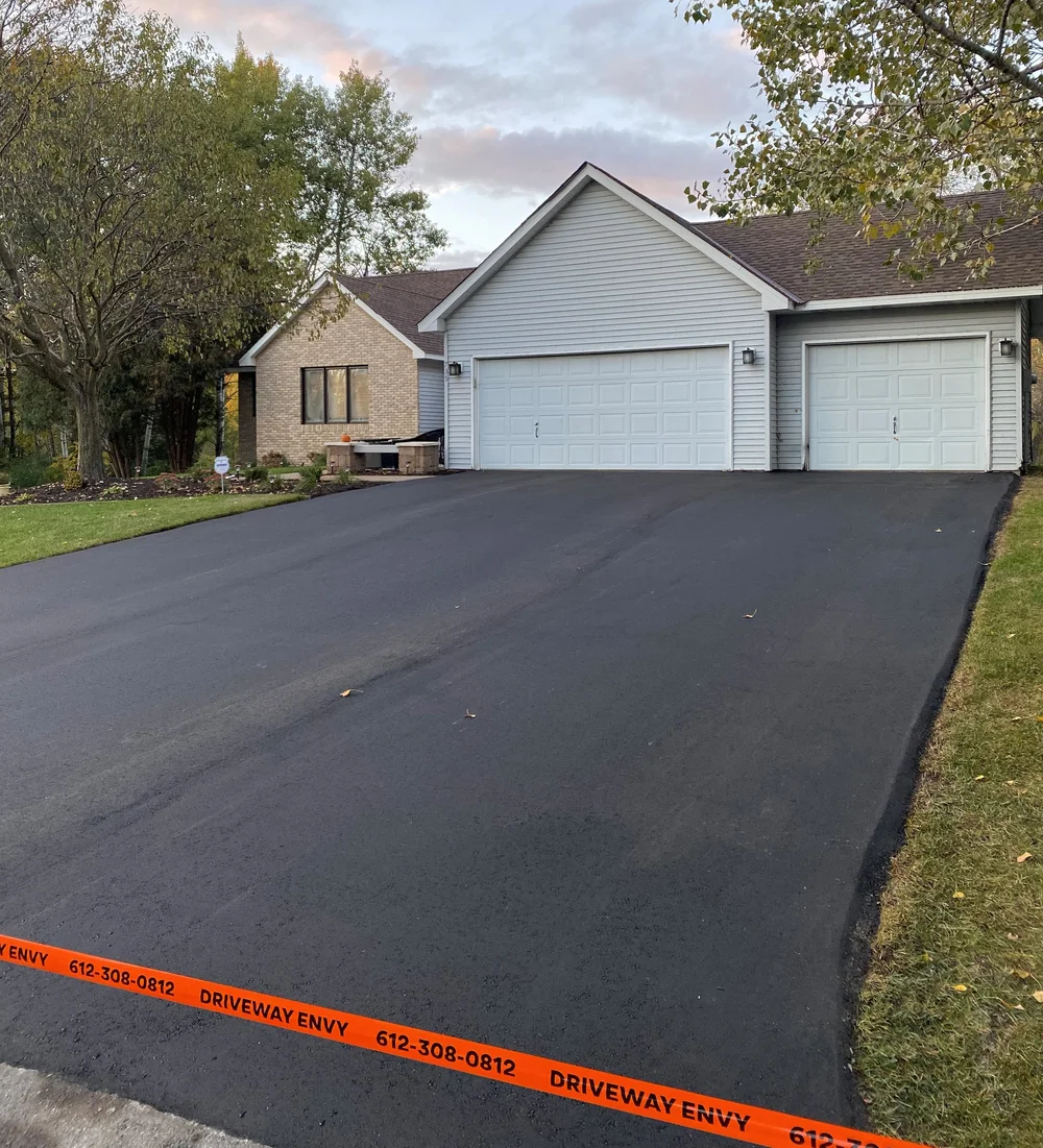 Driving On New Asphalt Driveway