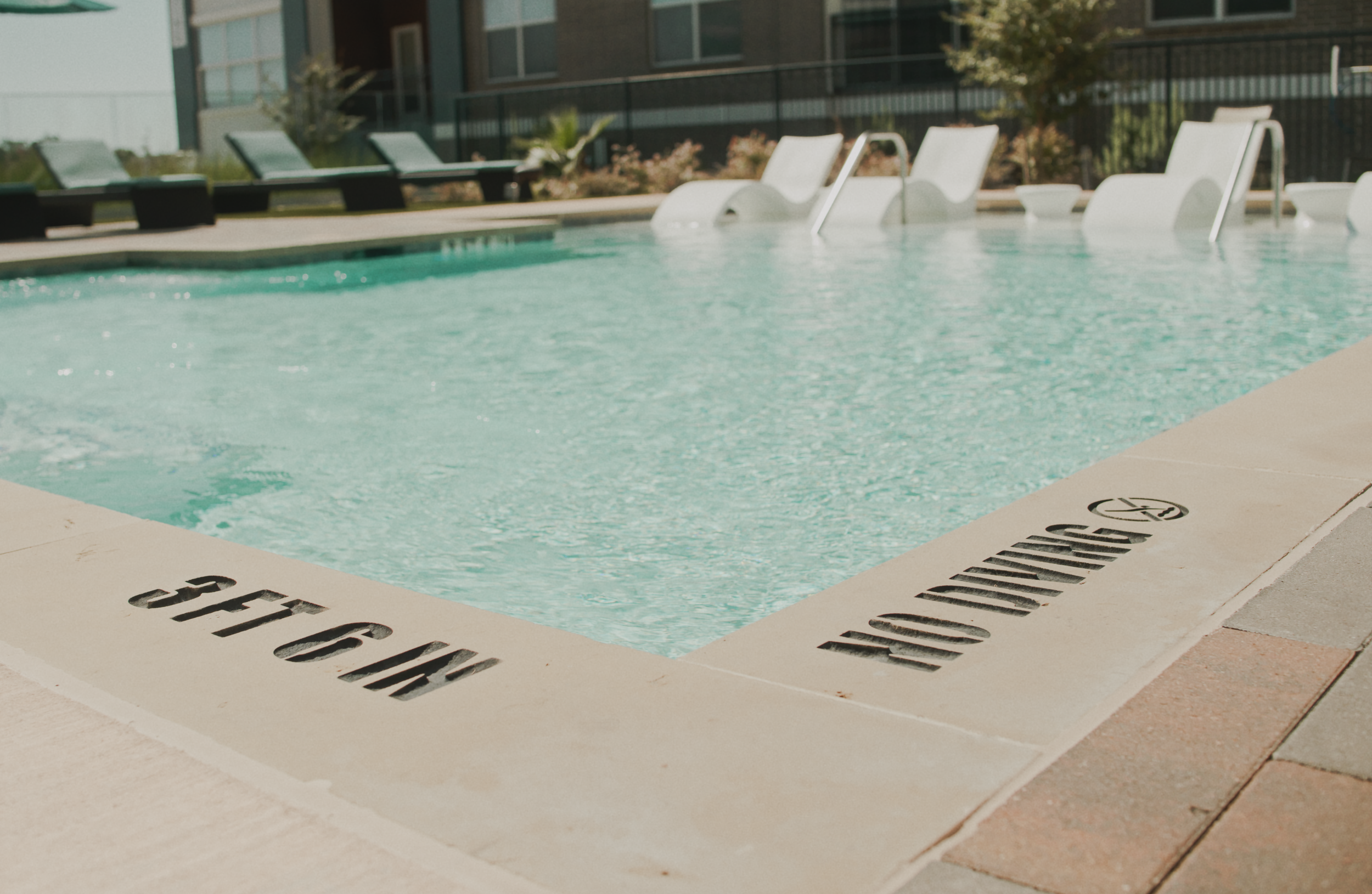 Sandblasting Pool Depth Markers - Dallas and Fort Worth, Texas