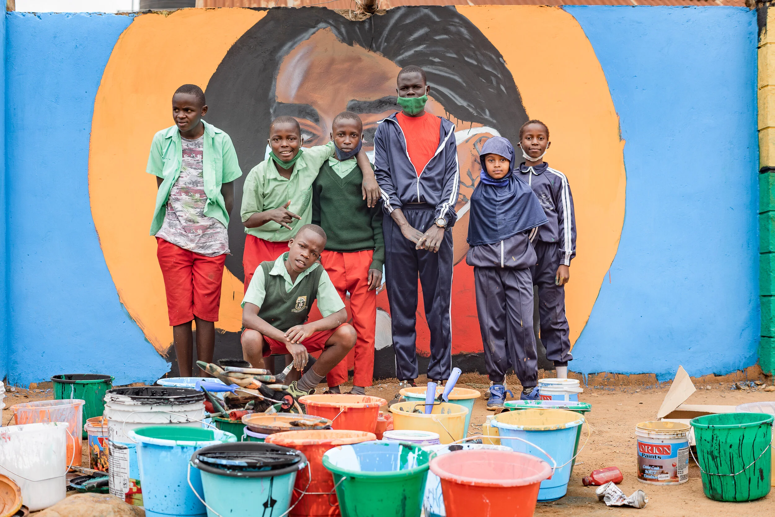 About Us — #PaintTheChange