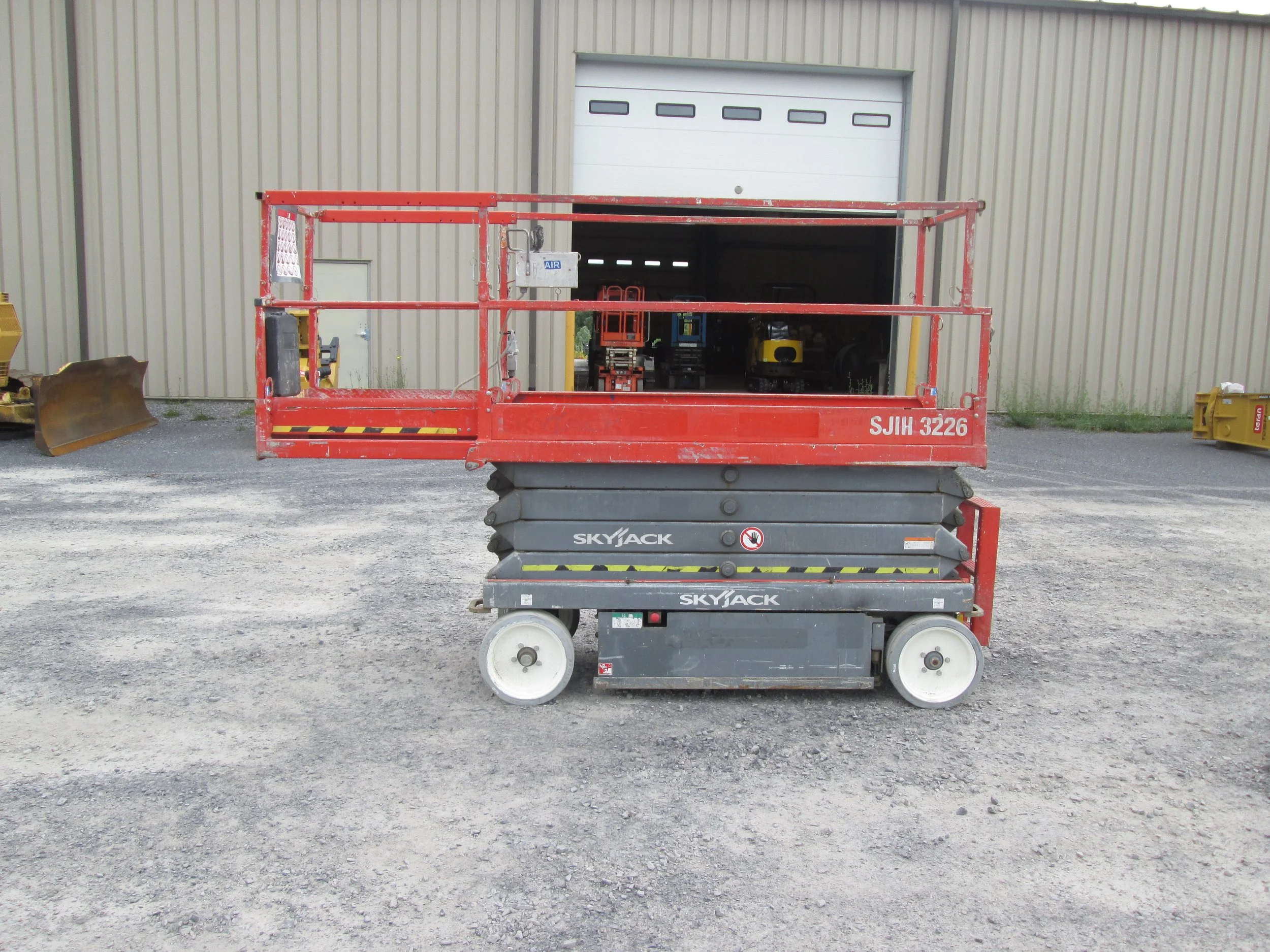 Scissor Lifts — Carroll Equipment - CNY'S Best Place For Construction ...