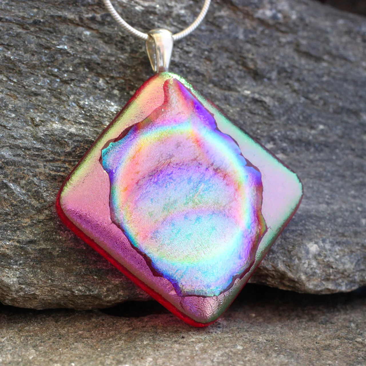 pink diamond ghost dichroic 1-3/8” glass pendant with an 18” sterling ...