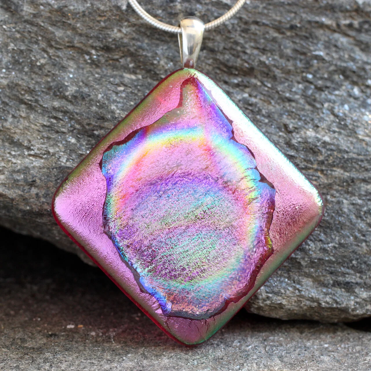 pink diamond ghost dichroic 1-3/8” glass pendant with an 18” sterling ...
