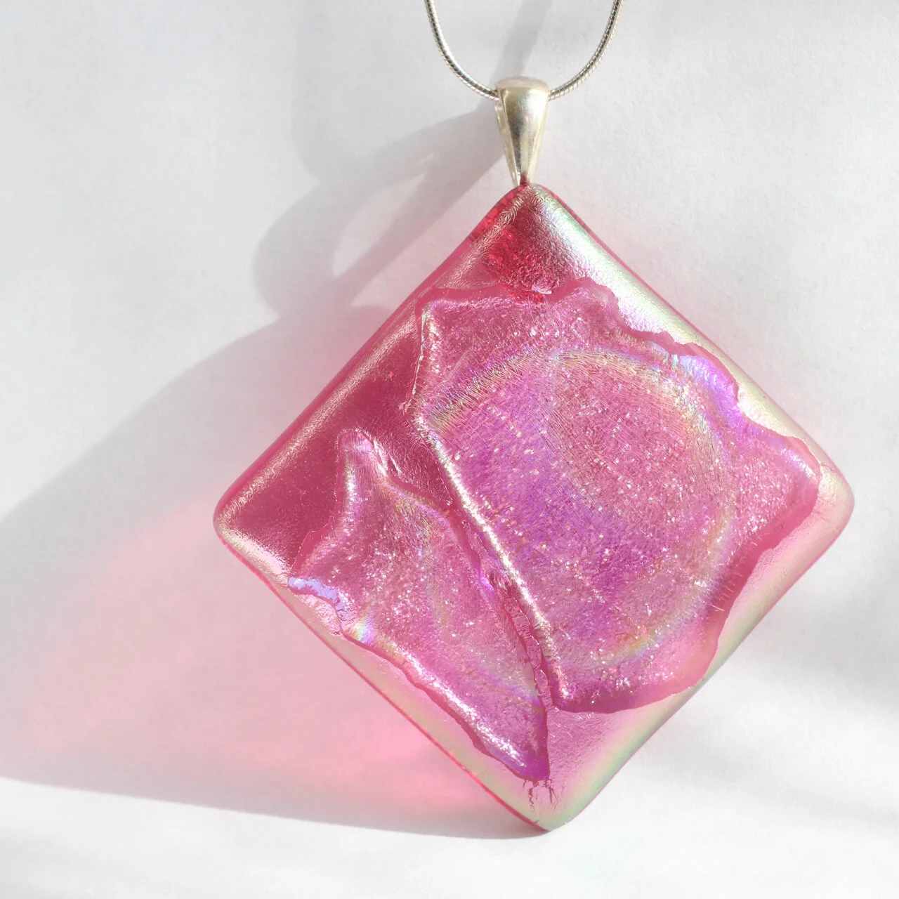 pink diamond ghost dichroic 1-3/8” glass pendant with an 18” sterling ...
