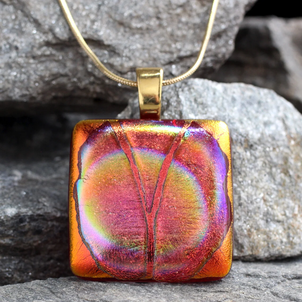 red confluence opaque dichroic 1-5/8” glass pendant with an 18 ...