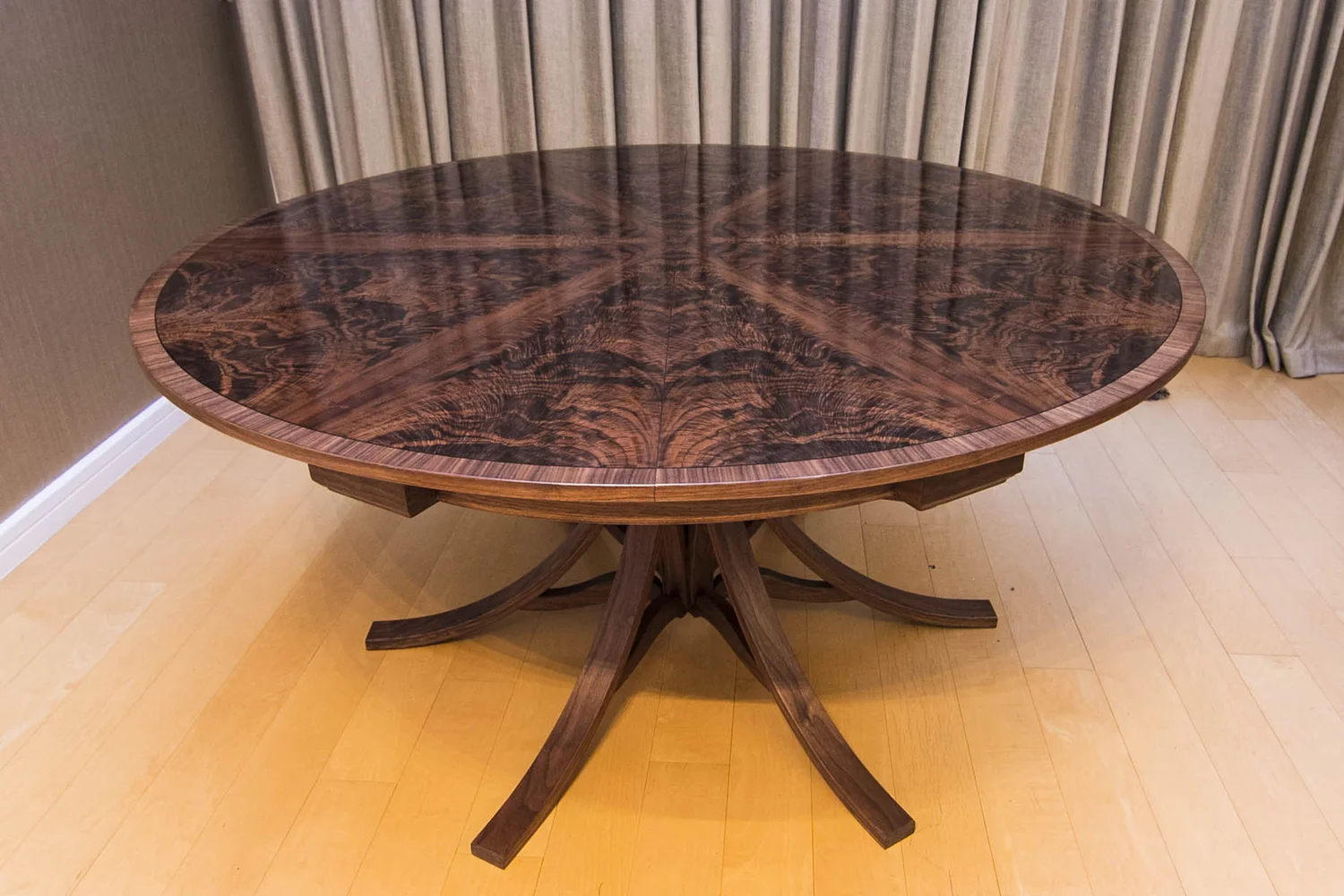 Walnut Curl Expanding Circular Dining Table — Johnson Furniture