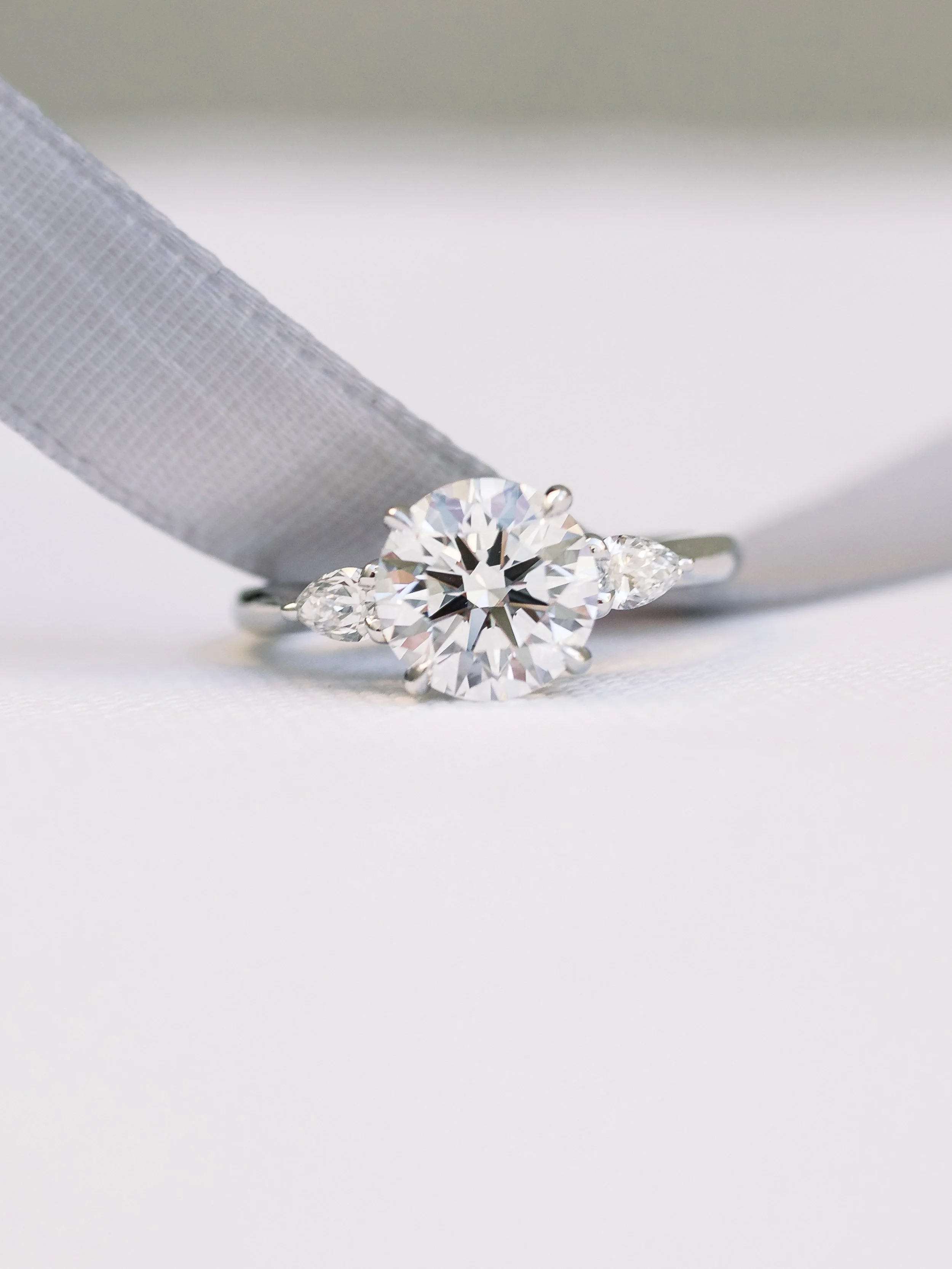 One and a Half Carat Round Lab Grown Diamond Engagement Rings