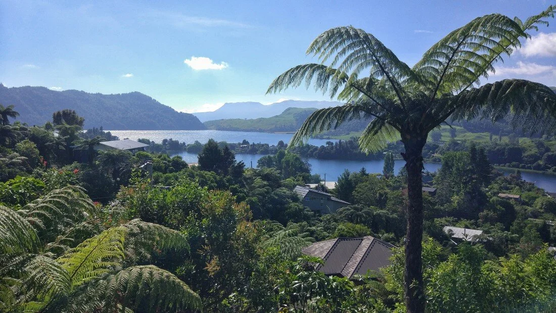 How To Explore Lake Wainamu And Surf A Sand Dune