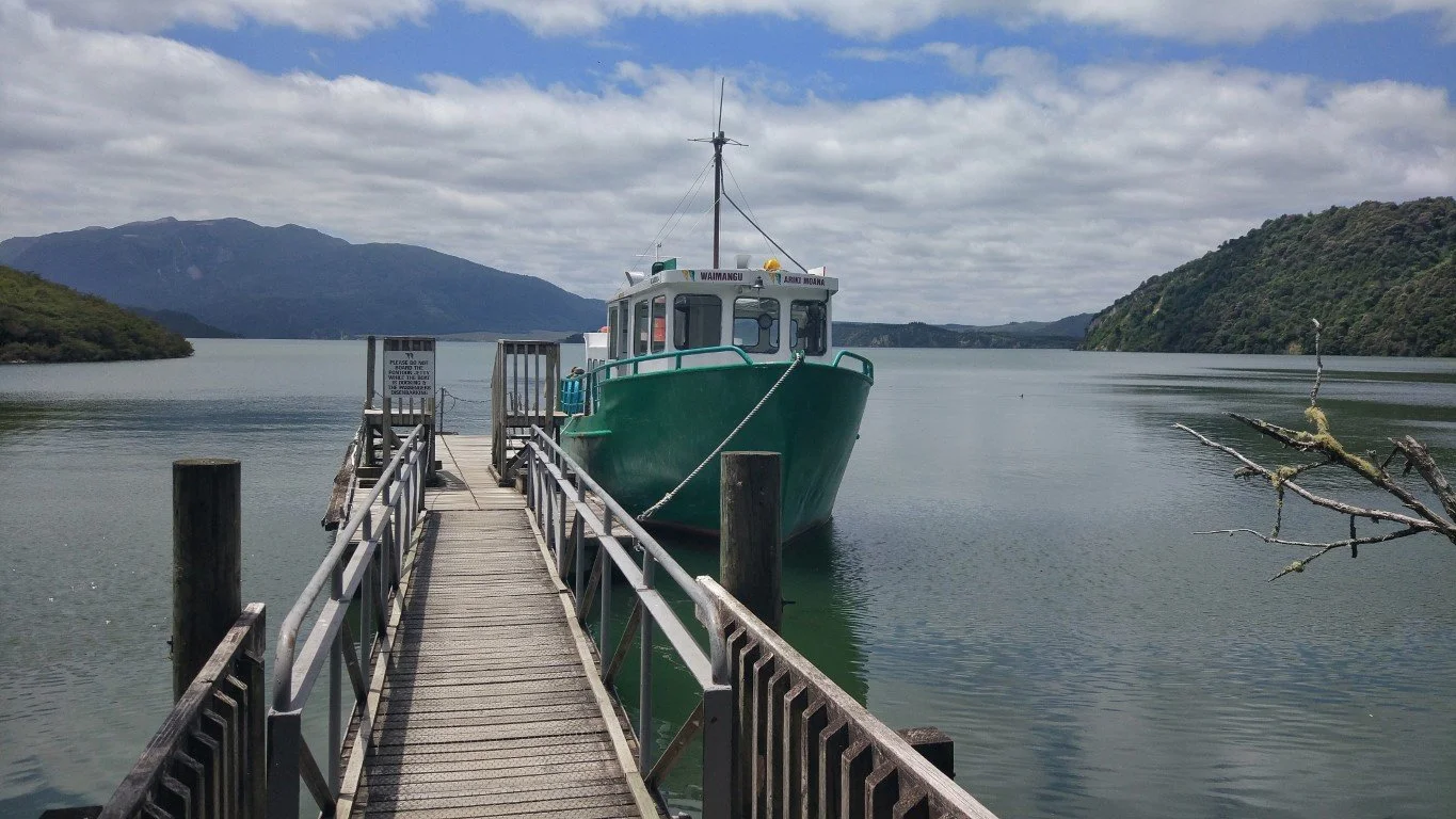 How To Explore Lake Wainamu And Surf A Sand Dune