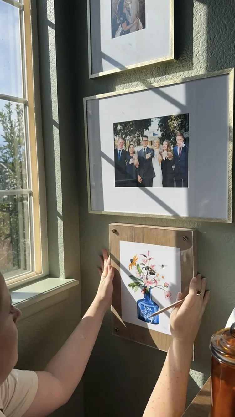 Creating a Gallery Wall Around a TV — DIY DARLING