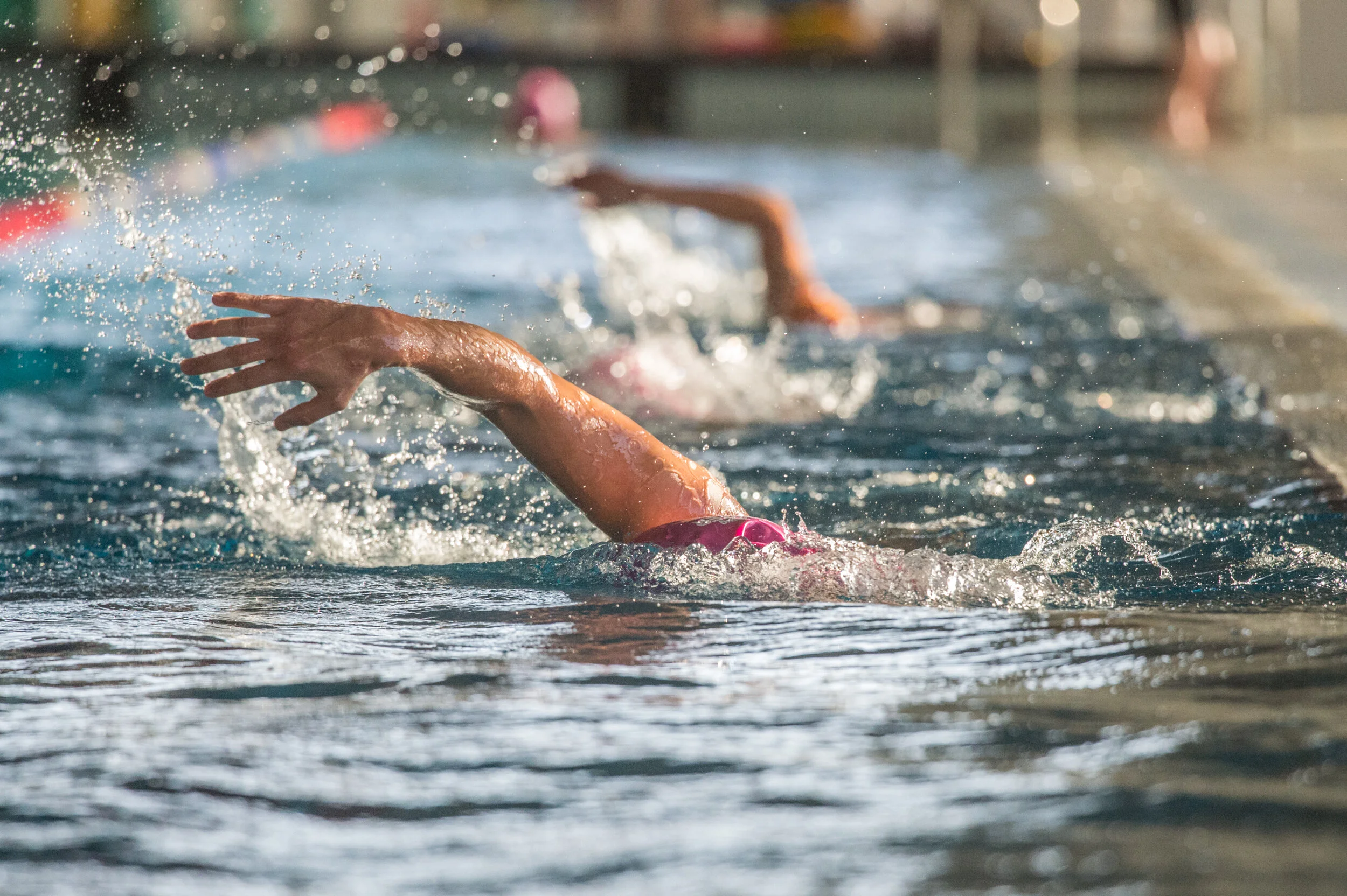 Tri Training Harder: Is straight arm swimming better than high elbow?