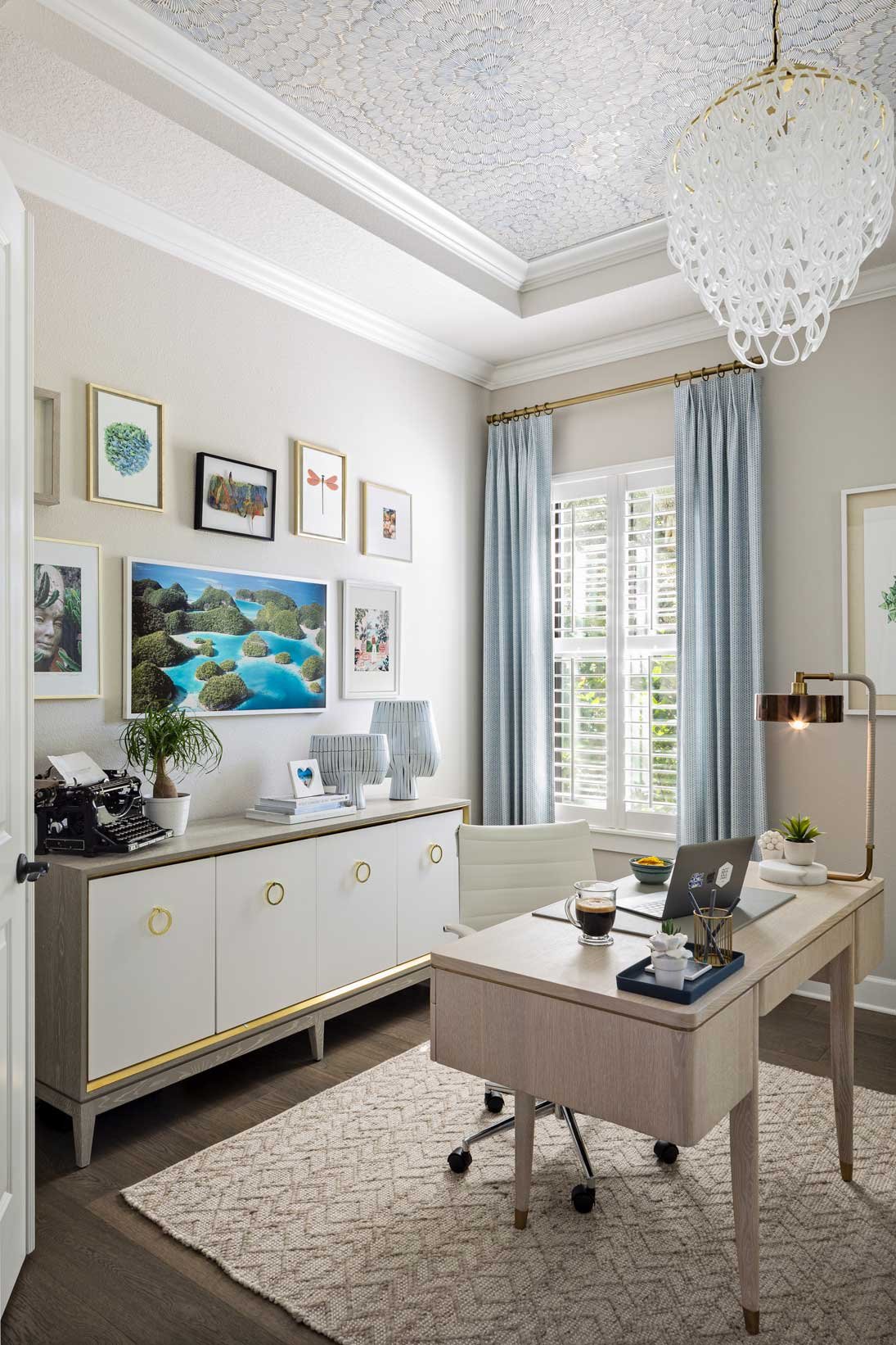 Unique lighting, textural wallpapers, and furnishings update this basic ...