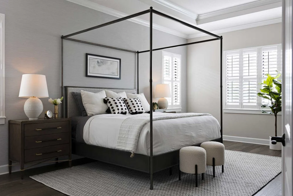 Unique lighting, textural wallpapers, and furnishings update this basic ...