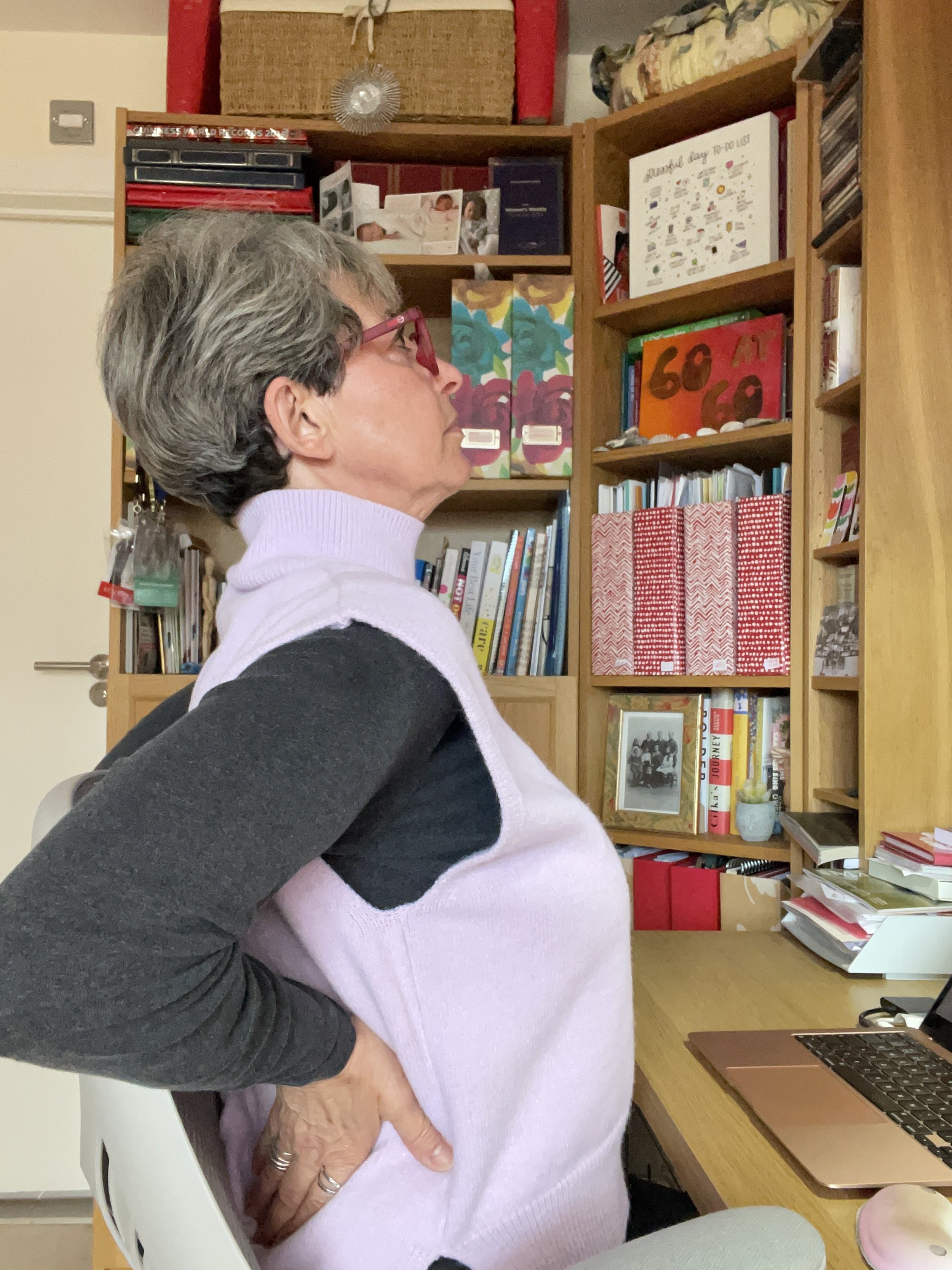 10 simple stretches to do at your desk — These Are The Heydays