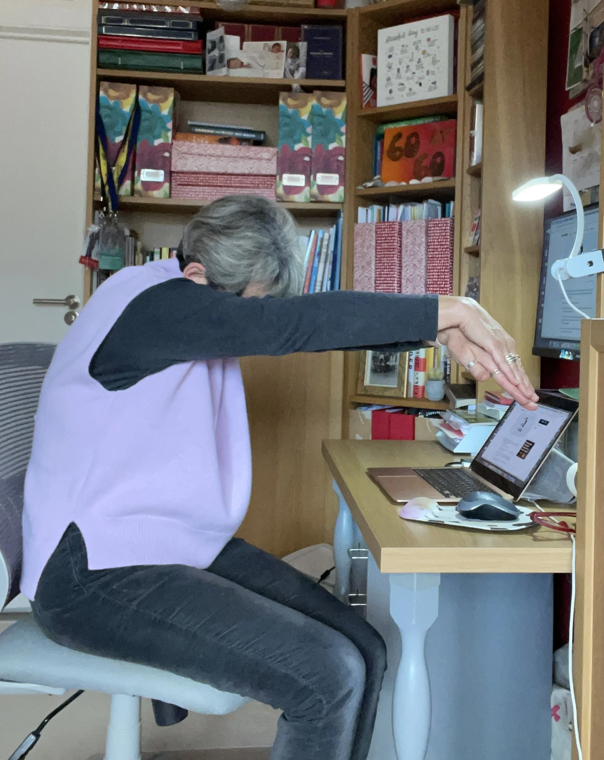 10 simple stretches to do at your desk — These Are The Heydays