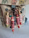 What to do with empty plastic thread spools — Sum of their Stories ...