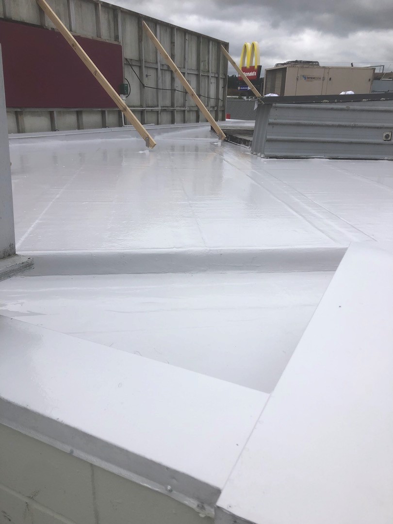 Flat Roofs — Seamless Coatings