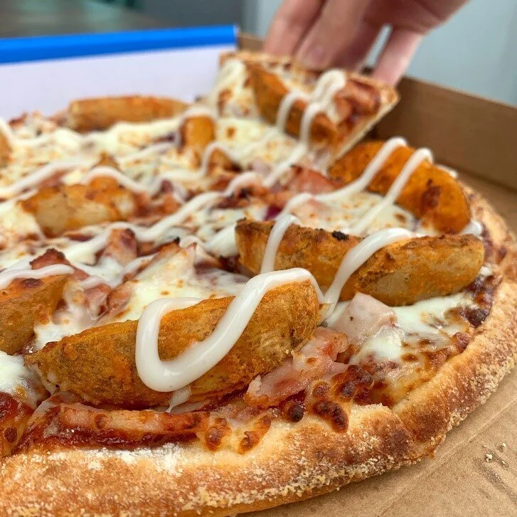 Around the world in… nine pizzas! — Domino's Newsroom
