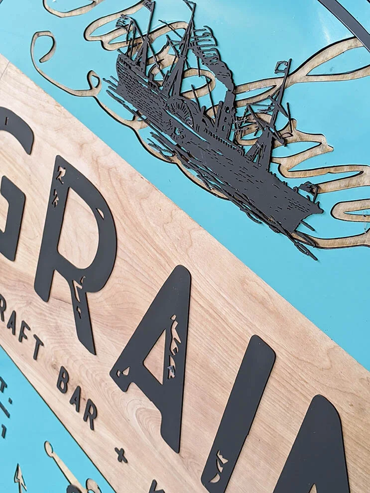 Custom laser cut business signs — Pinpoint Creative Studio