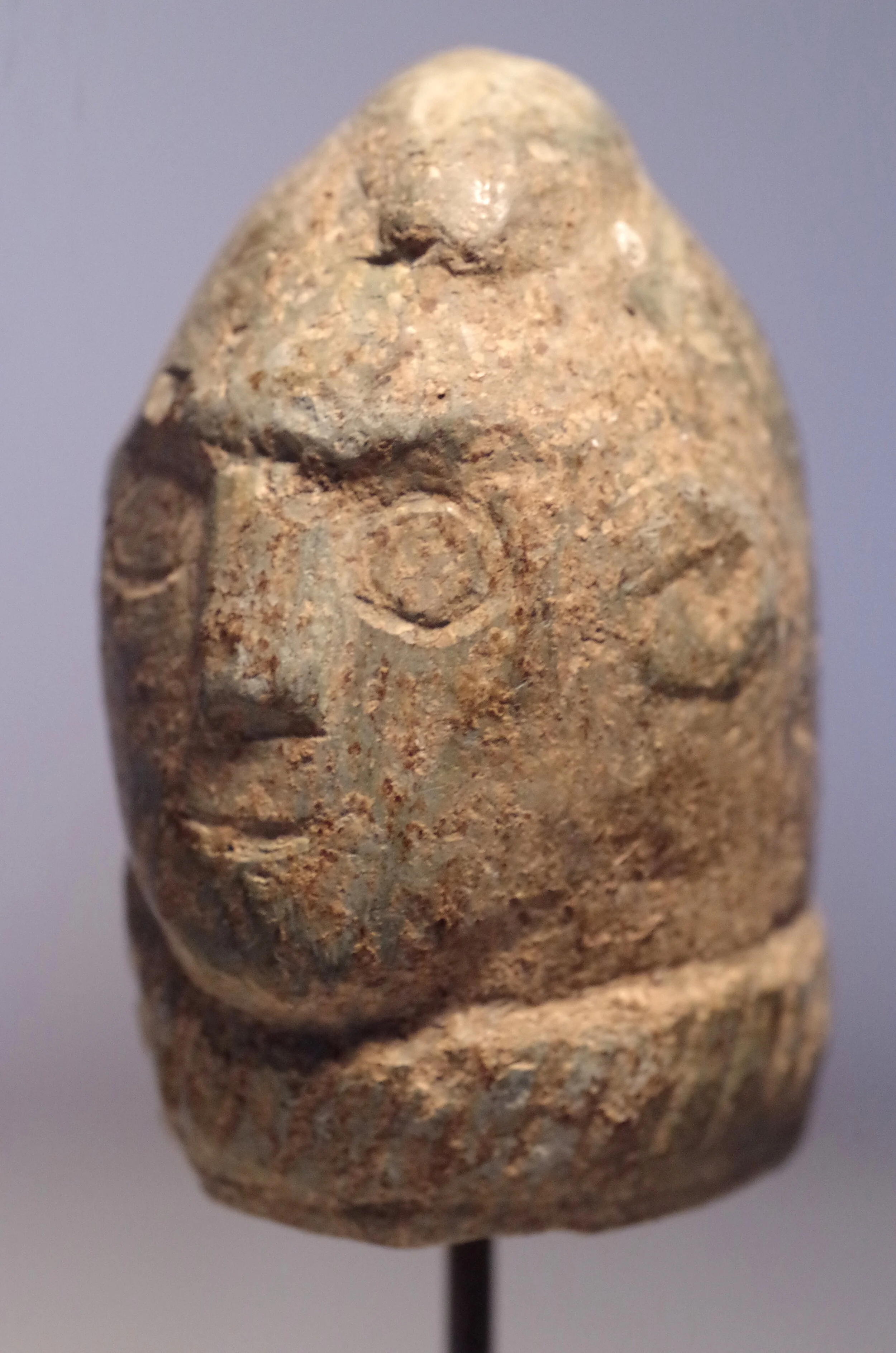 4 amulet stone masks — Magellan Art Gallery