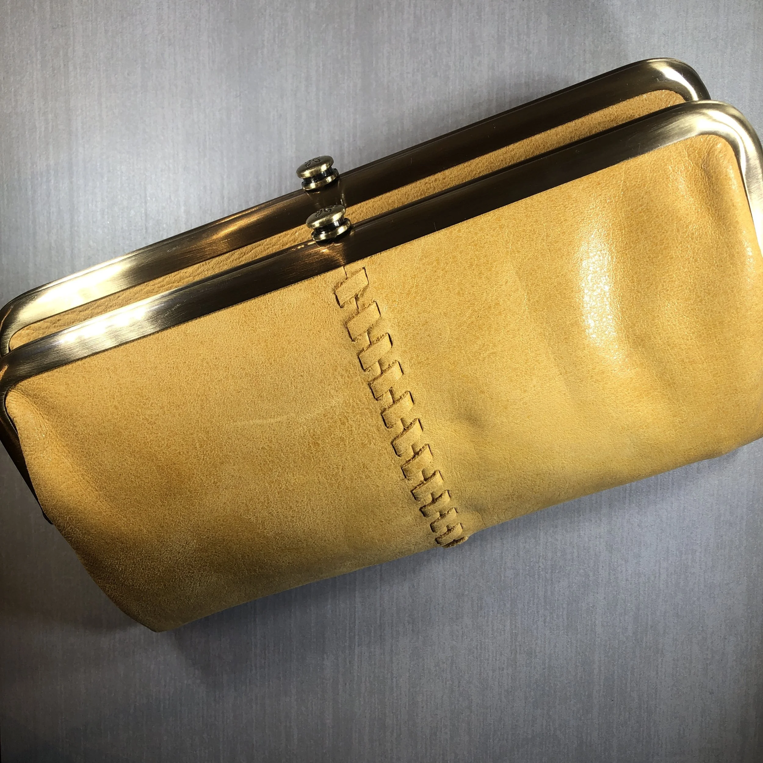 Fashion-forward accessories including scarves, handbags, wallets and ...