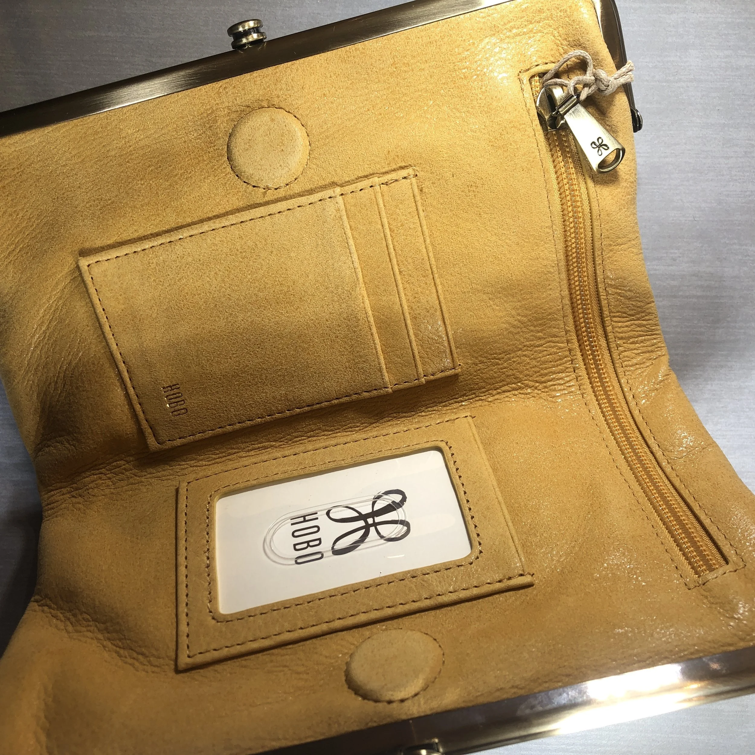 Fashion-forward accessories including scarves, handbags, wallets and ...
