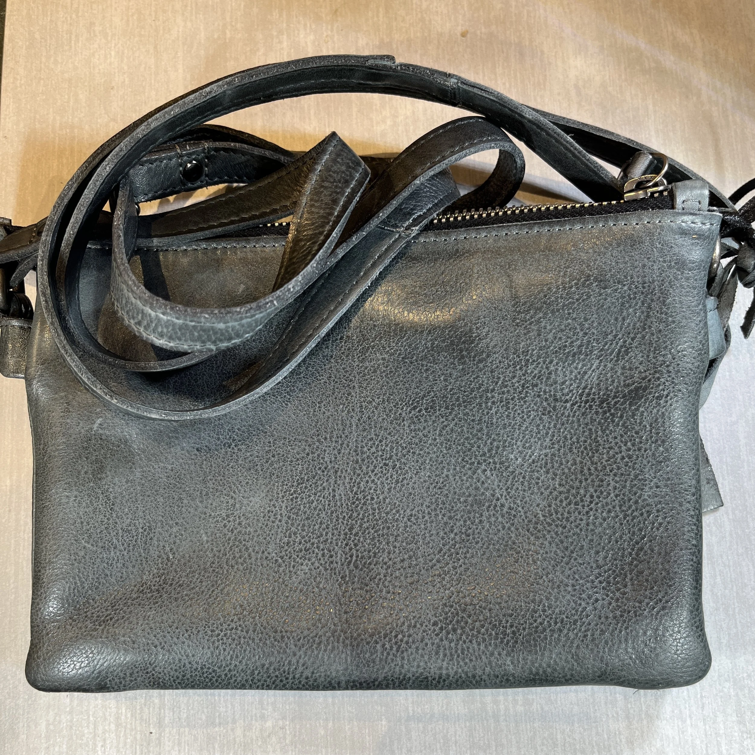 Fashion-forward accessories including scarves, handbags, wallets and ...