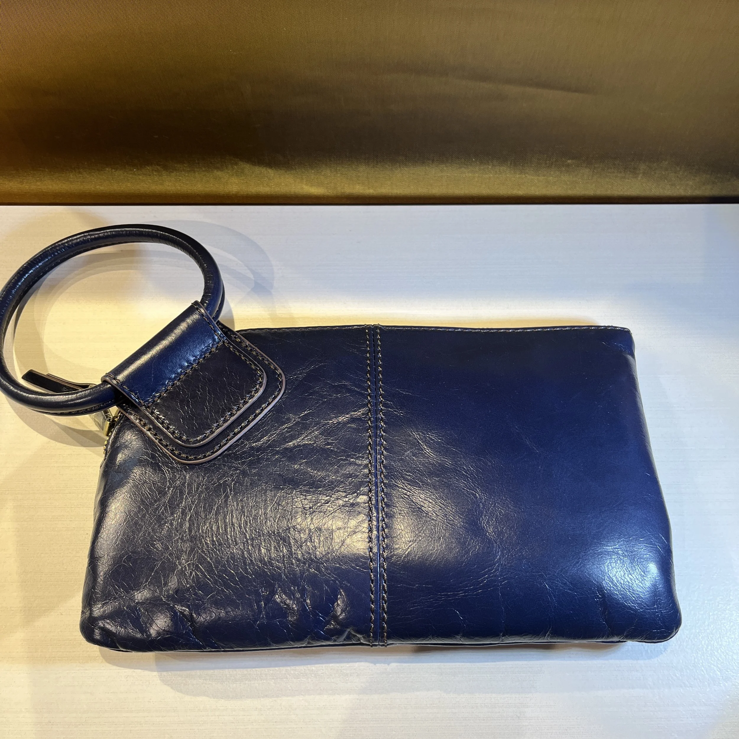 Fashion-forward accessories including scarves, handbags, wallets and ...