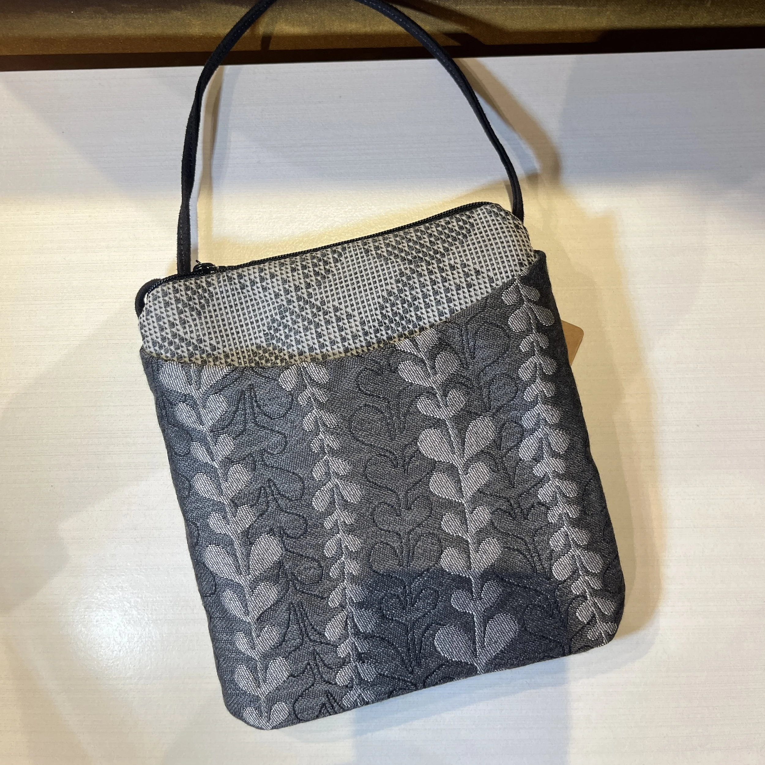 Fashion-forward accessories including scarves, handbags, wallets and ...