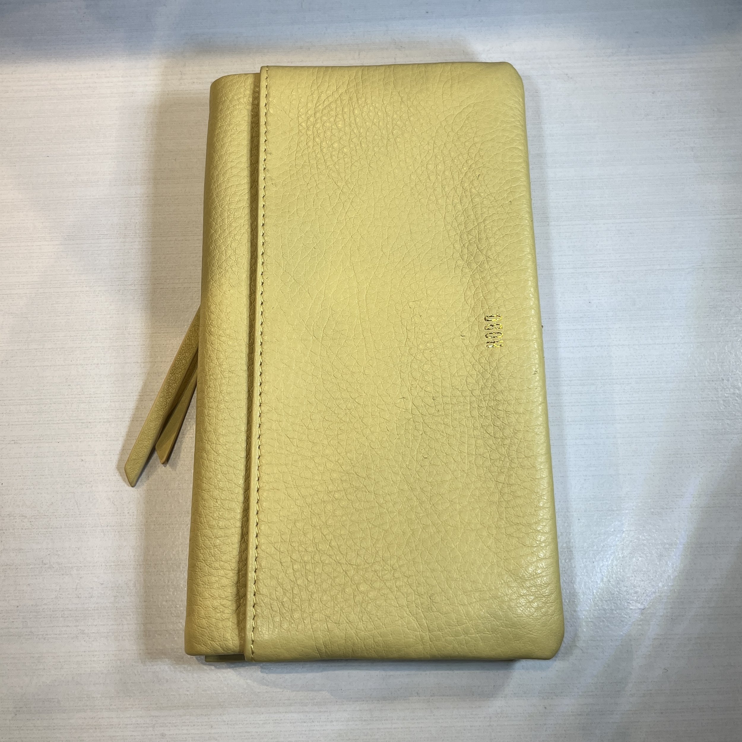 Fashion-forward accessories including scarves, handbags, wallets and ...