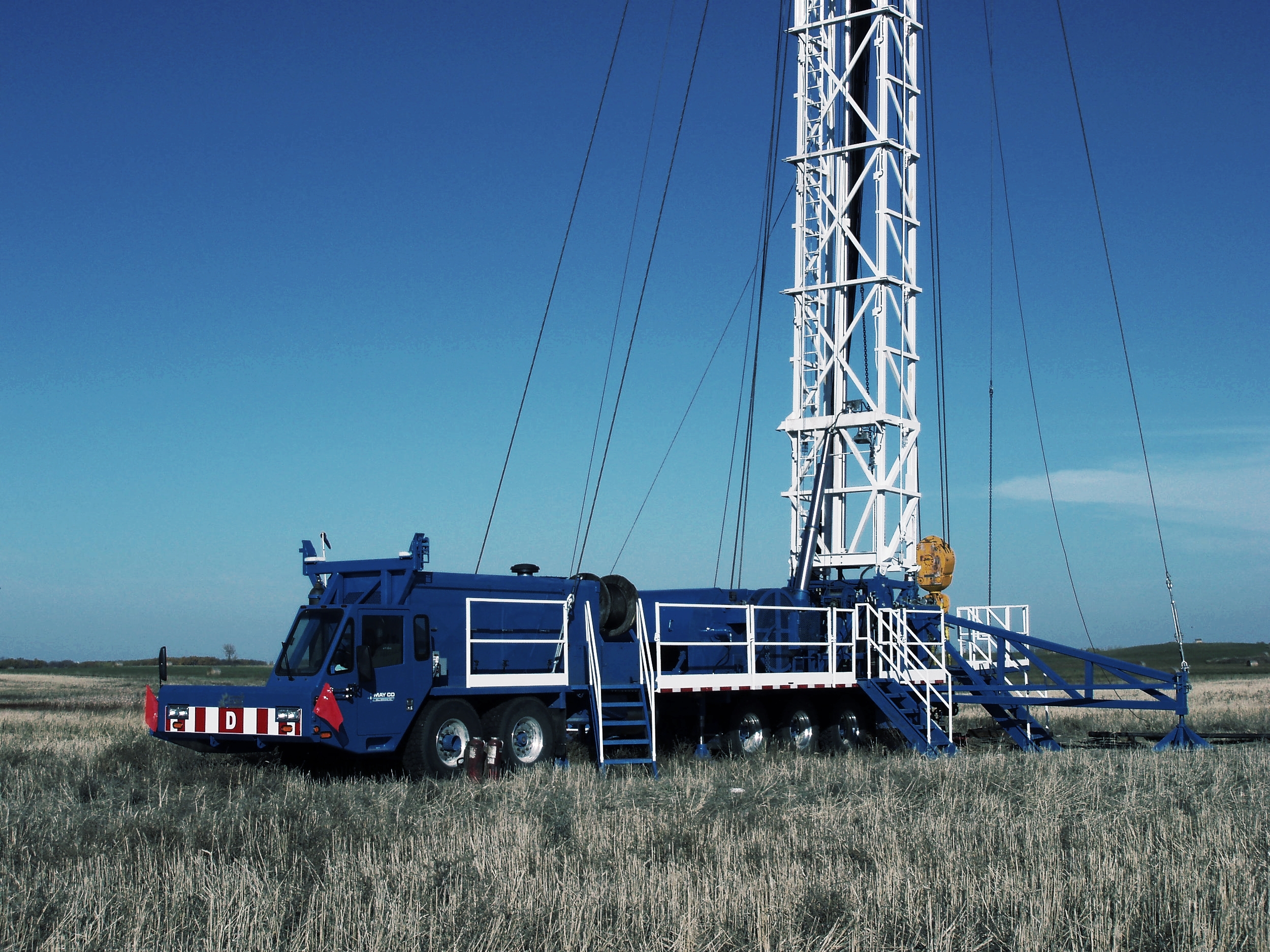 Service Rigs — Mayco Well Servicing