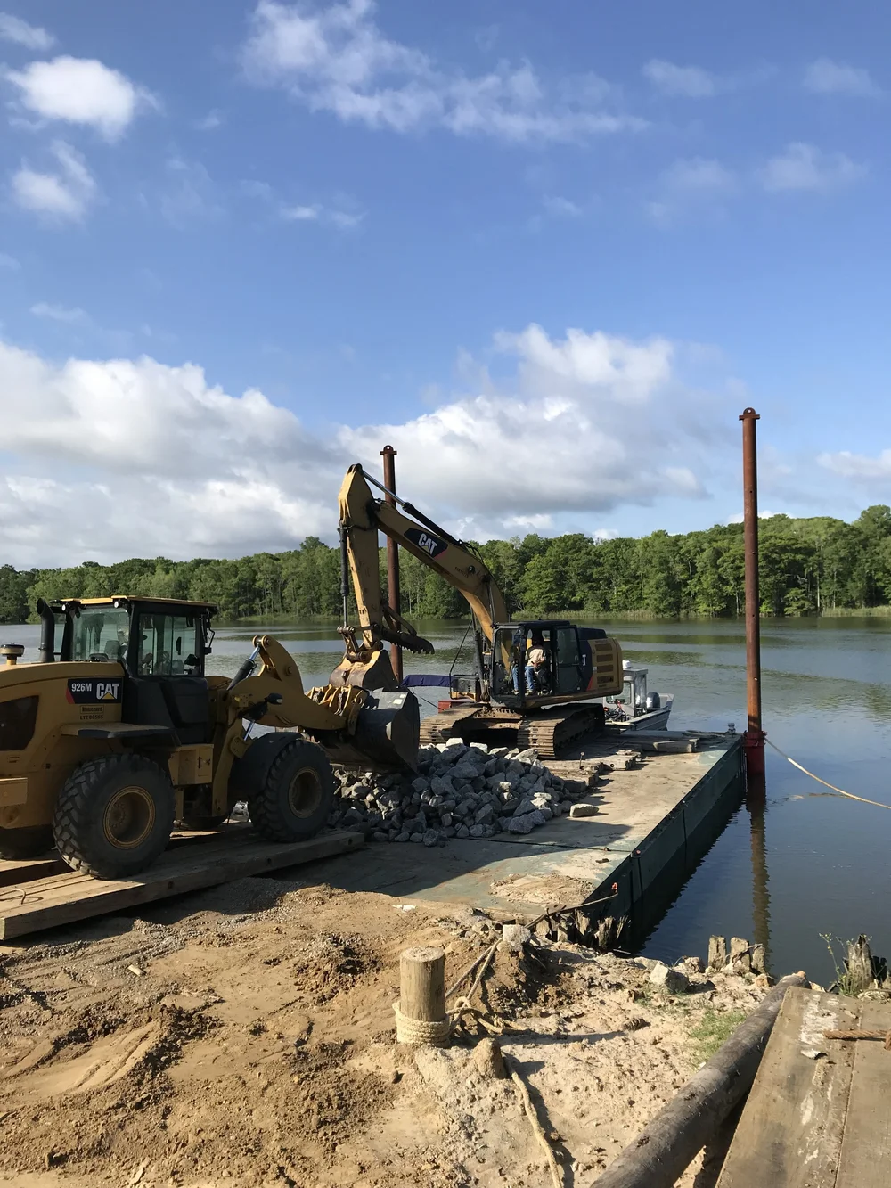 Photo gallery of dike work, seawall construction, and paving, grading ...