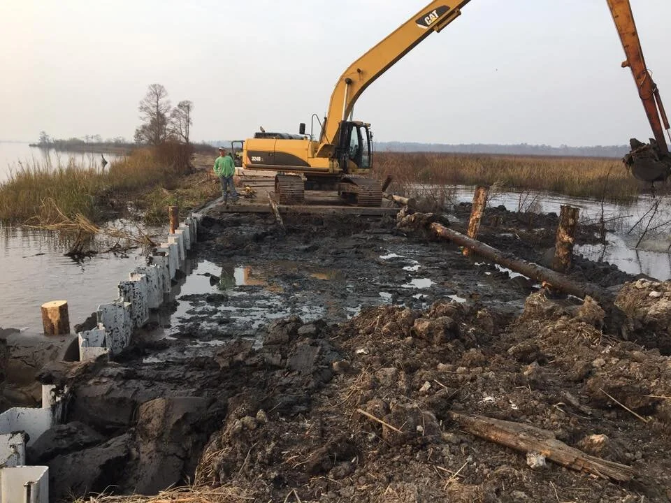 Photo gallery of dike work, seawall construction, and paving, grading ...