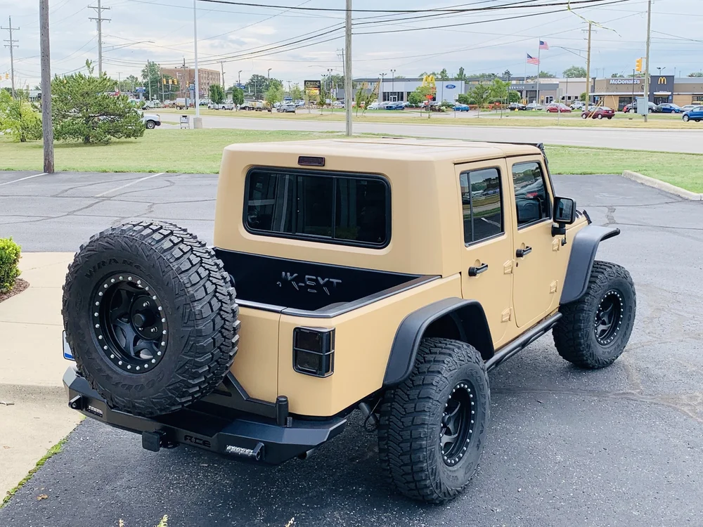 Lifted Jeep Wrangler 4 Door Tan