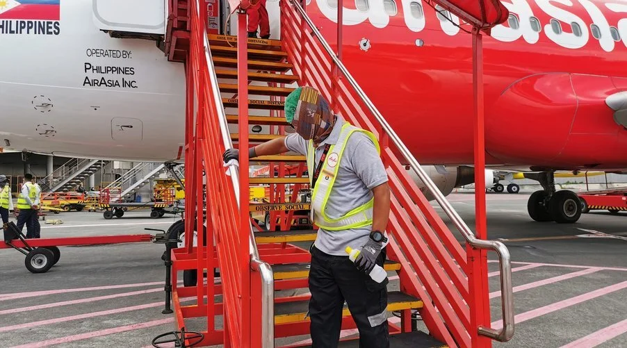 AirAsia cabin crew walks us through the new norm of safe flying ...