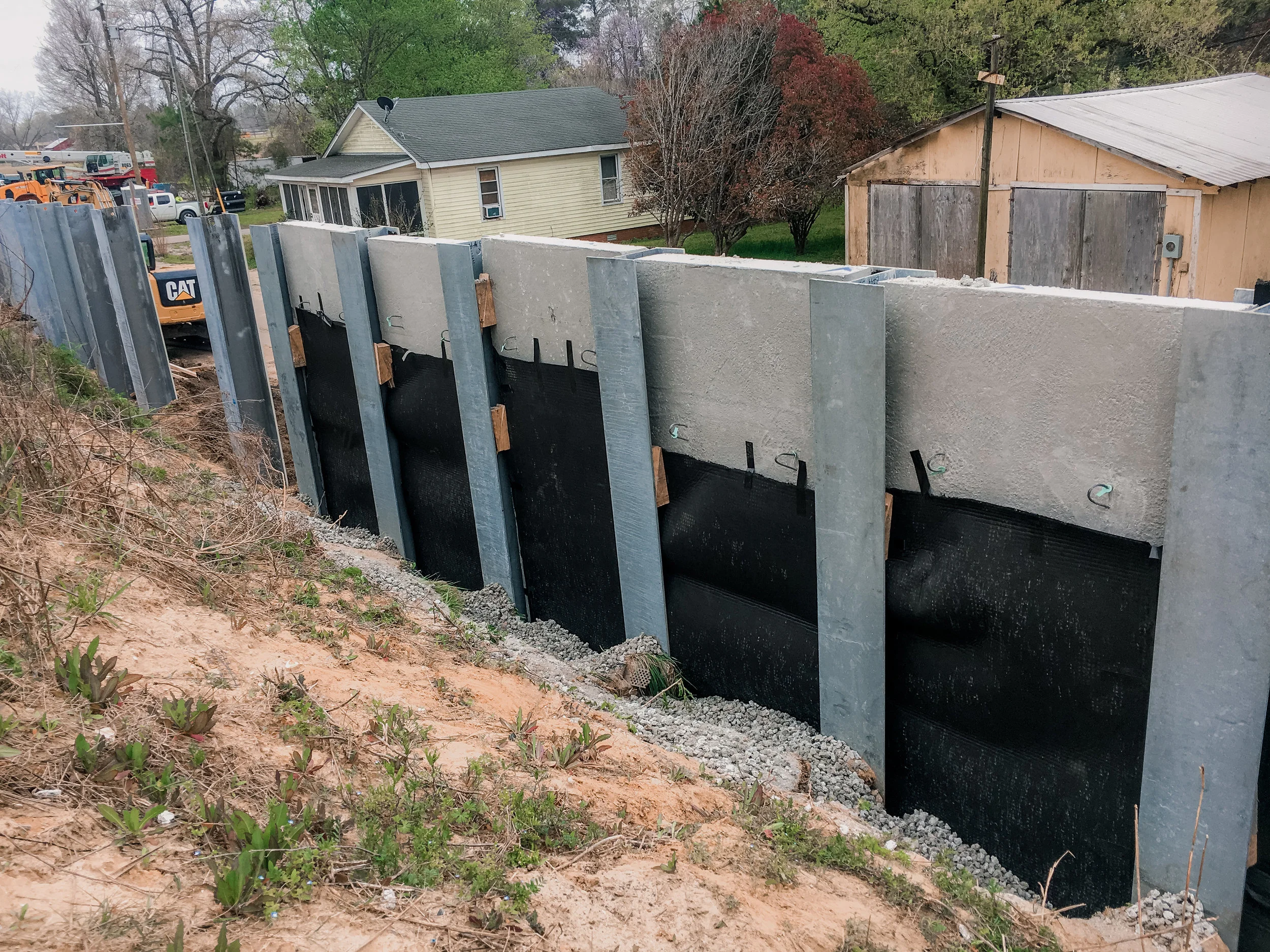 Soldier Pile & Lagging Wall — AWD - American Wick Drain