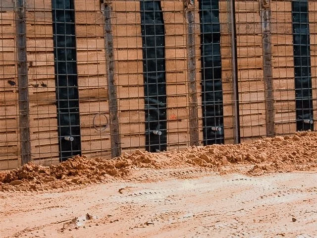 Soldier Pile & Lagging Wall — AWD - American Wick Drain