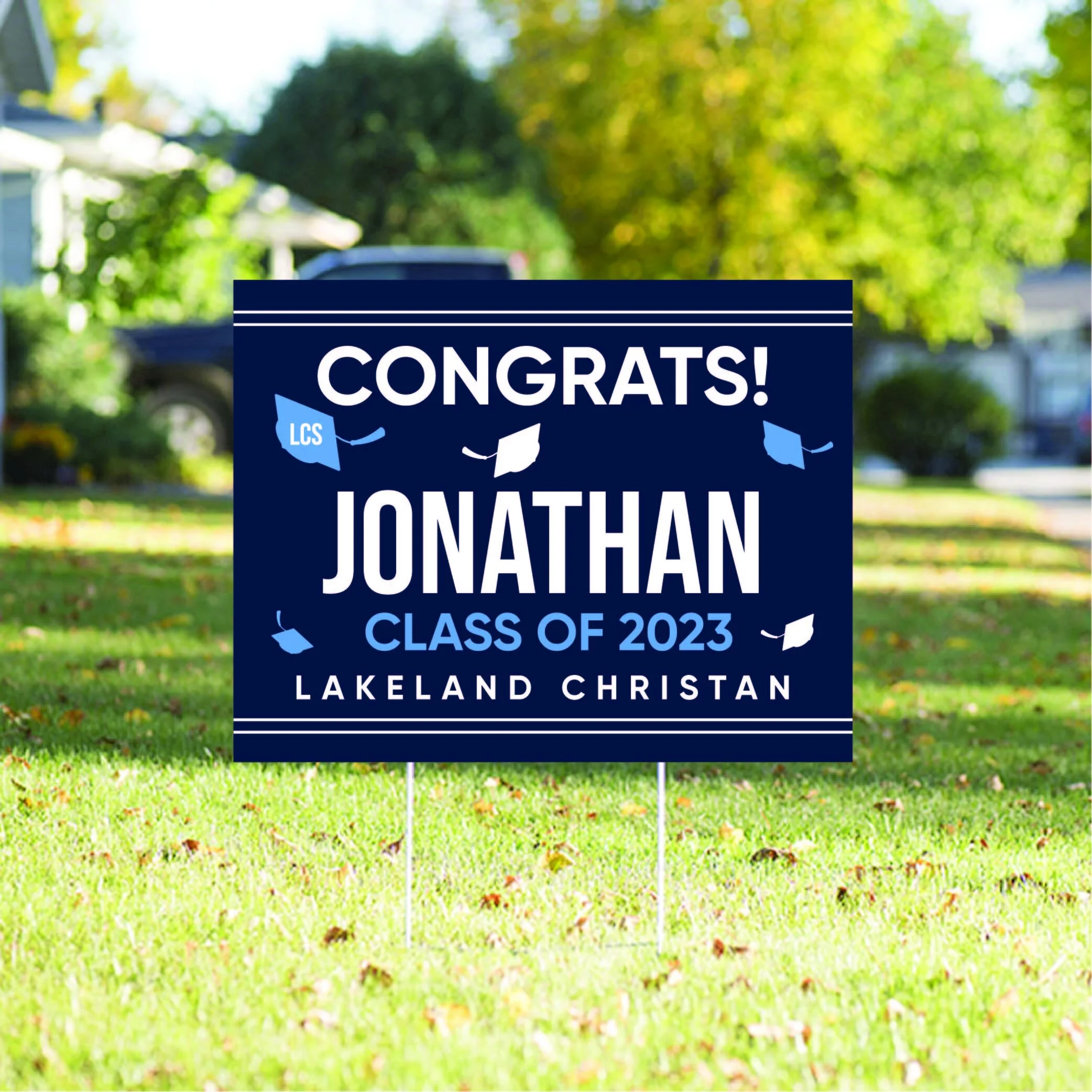 GRAD SIGNS — LEVEL SEVEN GRAPHICS, LLC.