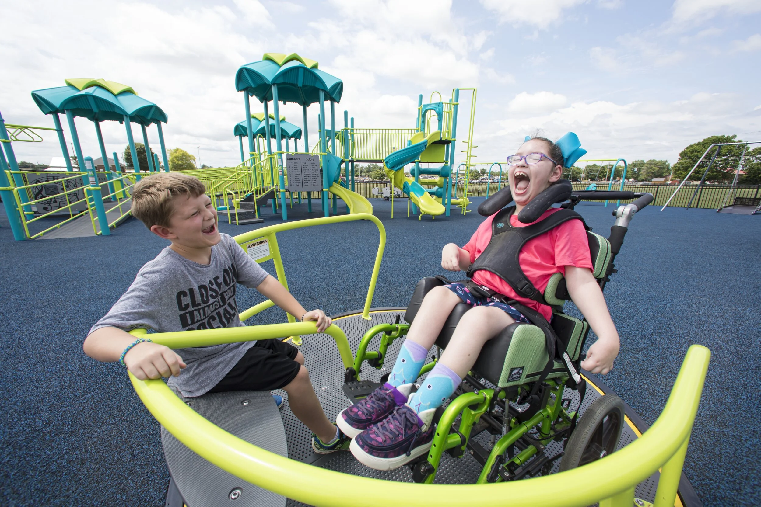 Inclusive play equipment: Inclusive Whirl — Liberty Parks and Playgrounds