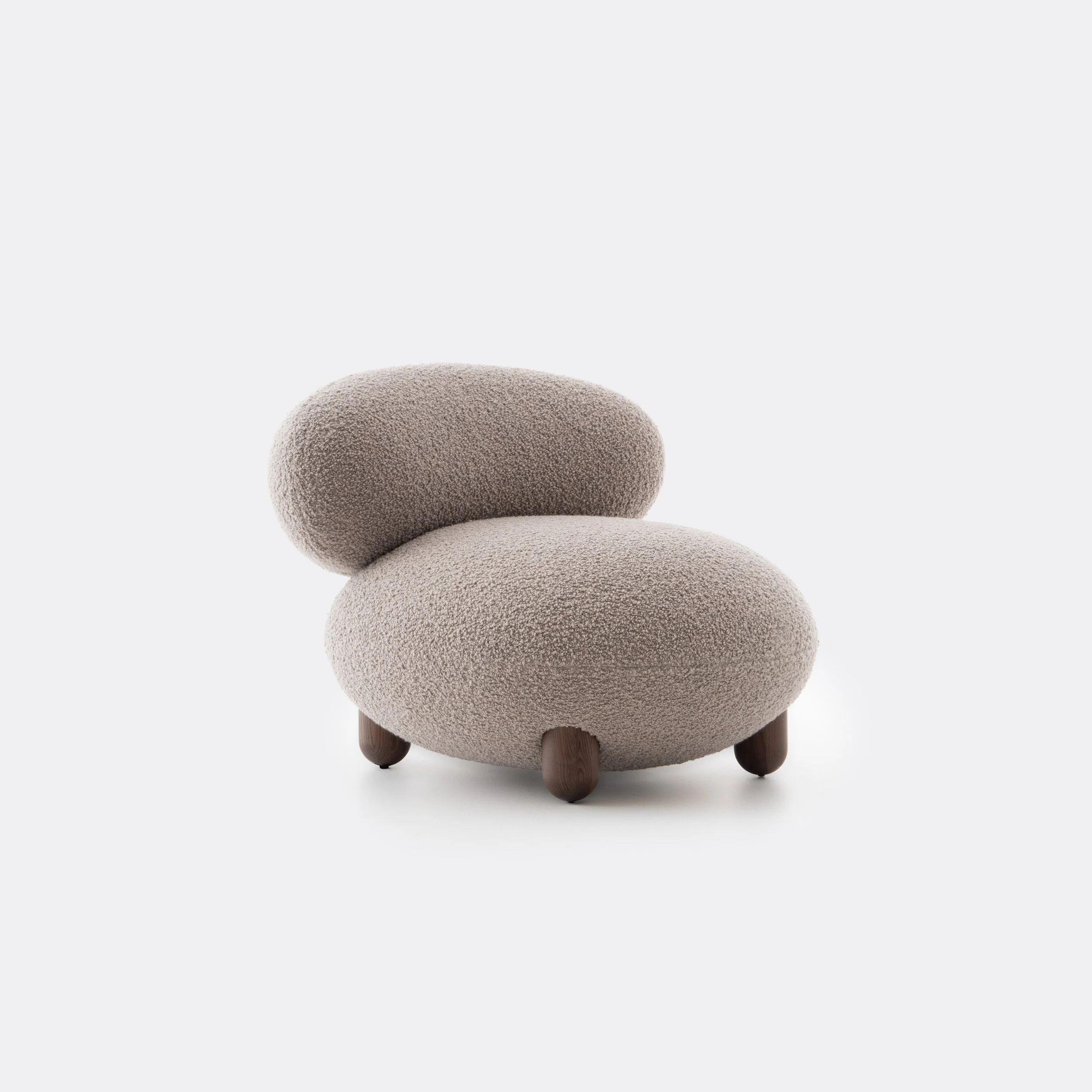 Flock Lounge Chair with ottoman combines bold forms and tactile ...