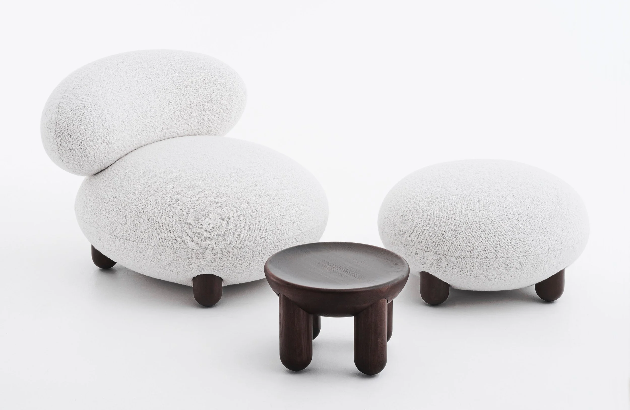 Flock Lounge Chair with ottoman combines bold forms and tactile ...
