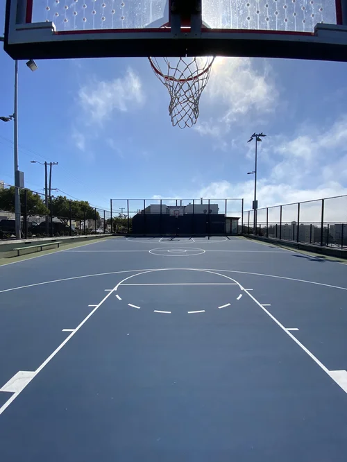 Outdoor Basketball Court At Night