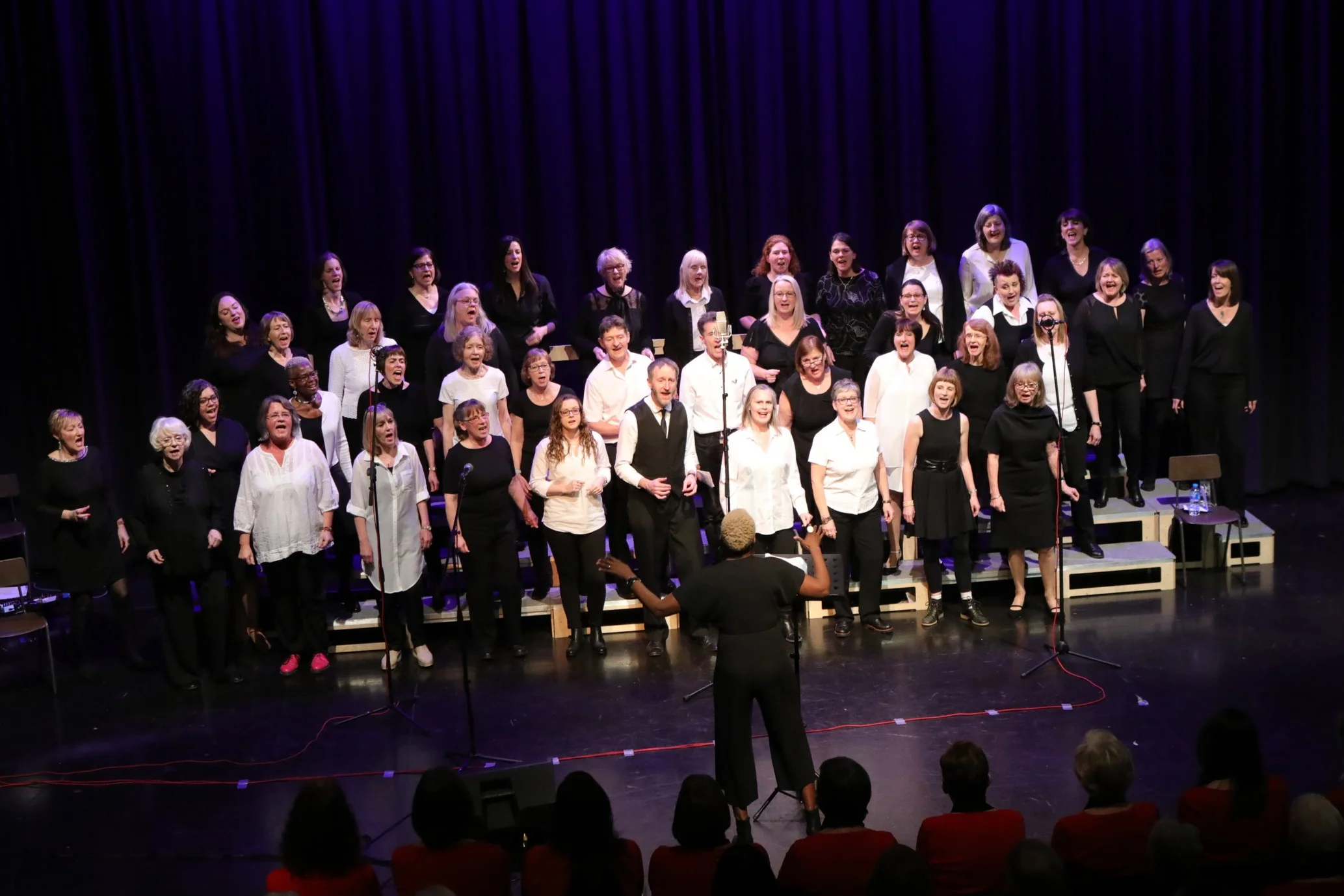 About Us — as one community choir