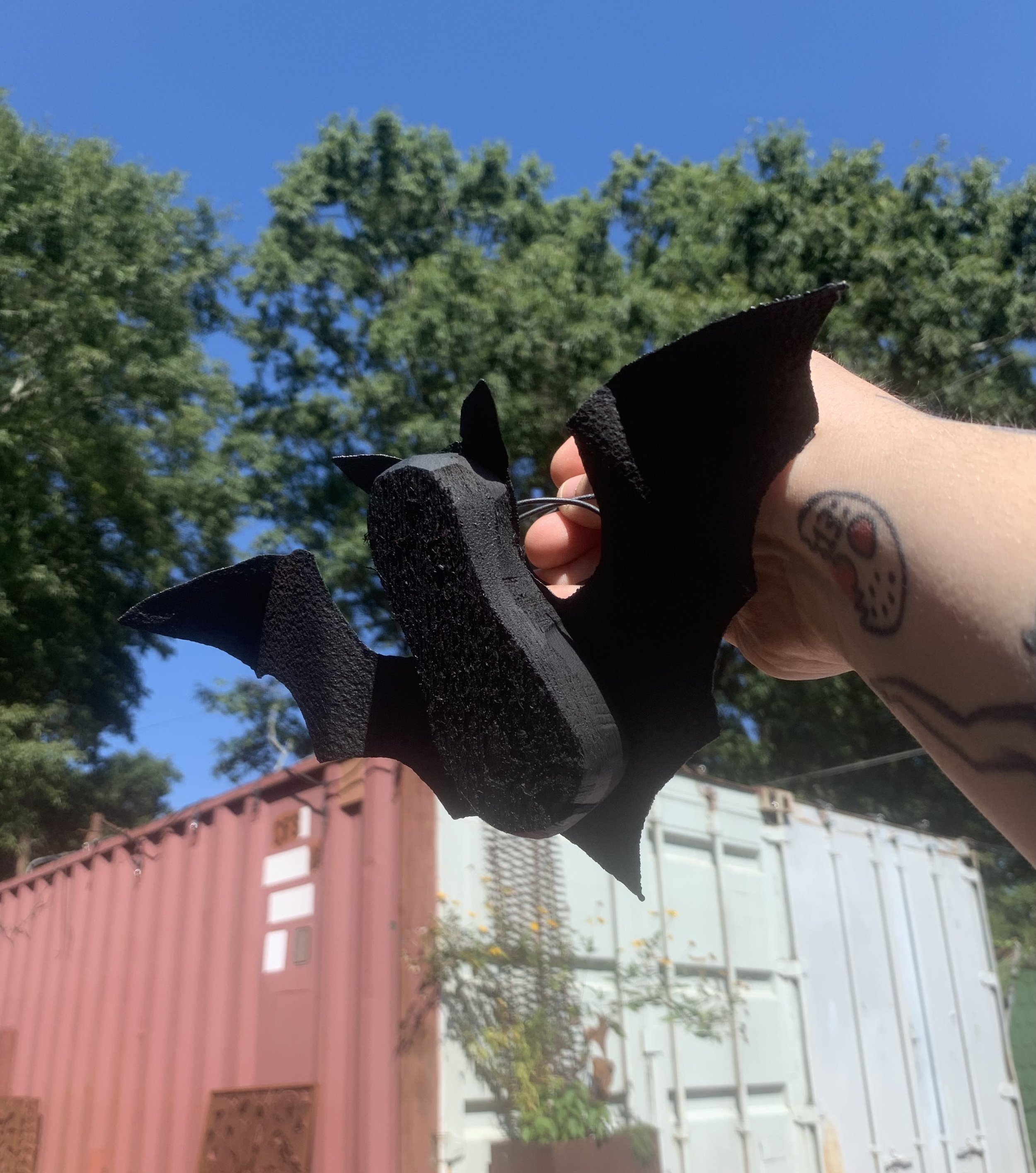 Hanging Bat Tattoo