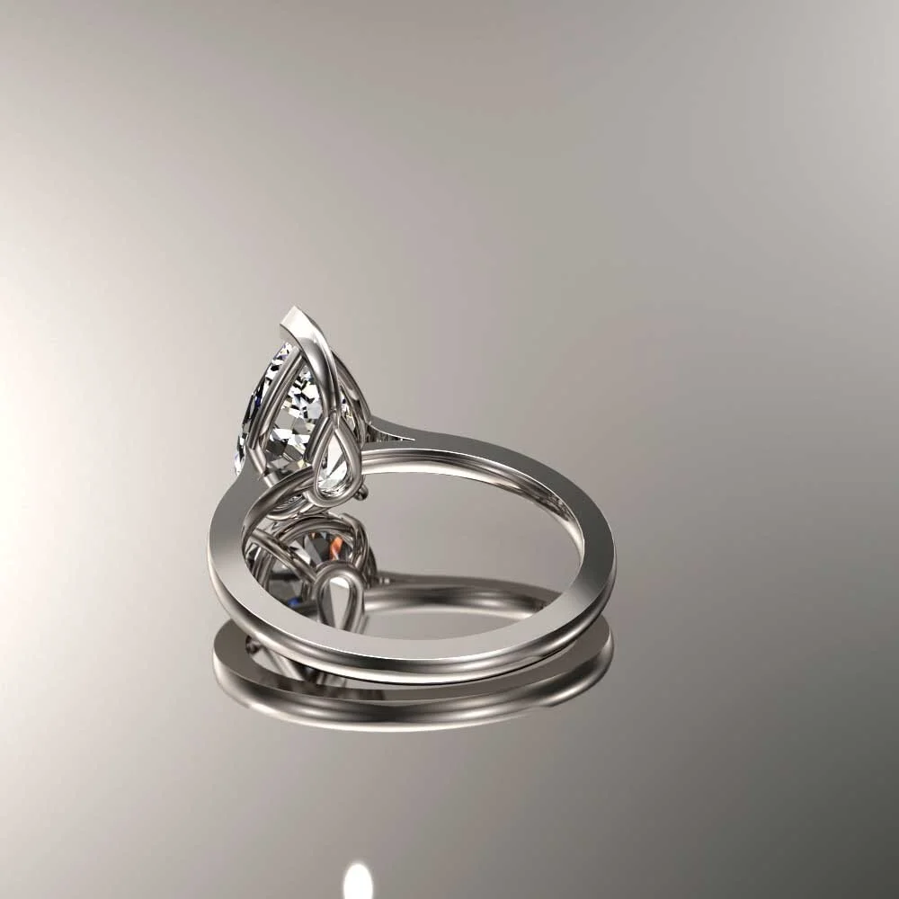 Custom pear engagement ring — Edward Fleming Jewellery