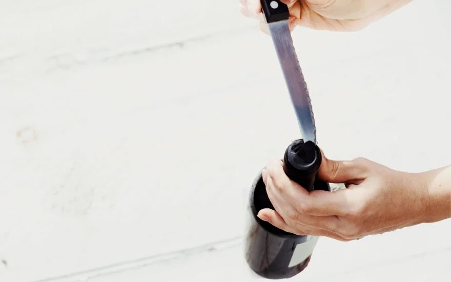 6 Ways To Open a Bottle Of Wine Without A Corkscrew — The Three Drinkers