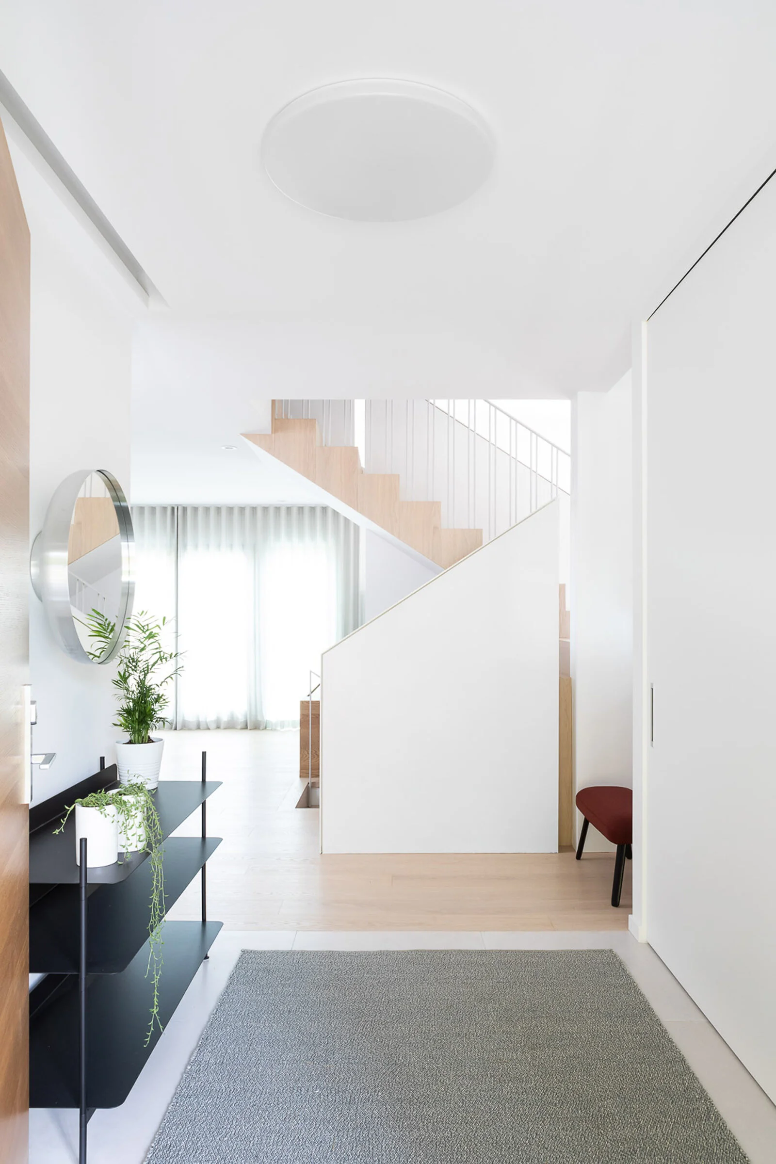 Warm Minimalism Pervades This Split-level Home — Design Anthology